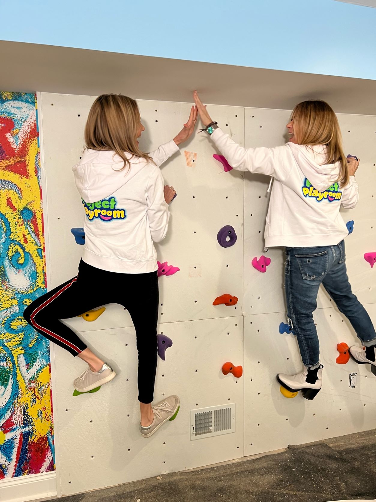 Colorful Wall Sconces Add Playful Vibe at Teen Center