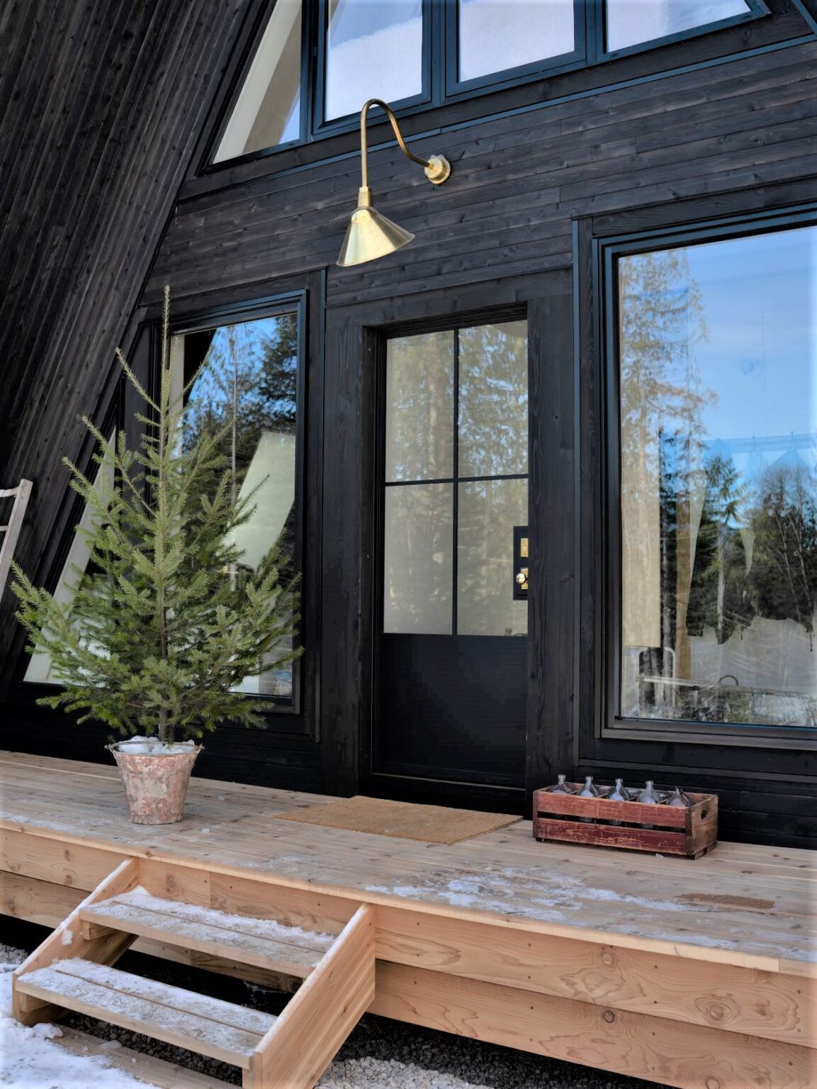 Brass Light Lends Perfect Pop of Color to New A-Frame Cabin